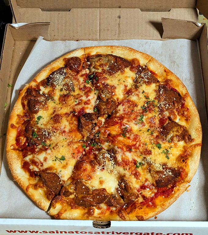 Pizza perfection in a cardboard throne. The pepperoni pizza's cheese pull alone is worth the drive from Cincinnati, Columbus, or even Michigan.