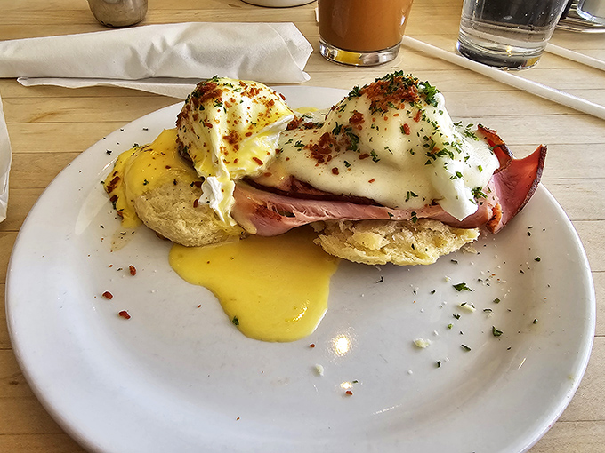 Eggs Benedict reimagined with Southern hospitality. Those perfectly poached eggs are having the kind of good day we all aspire to.