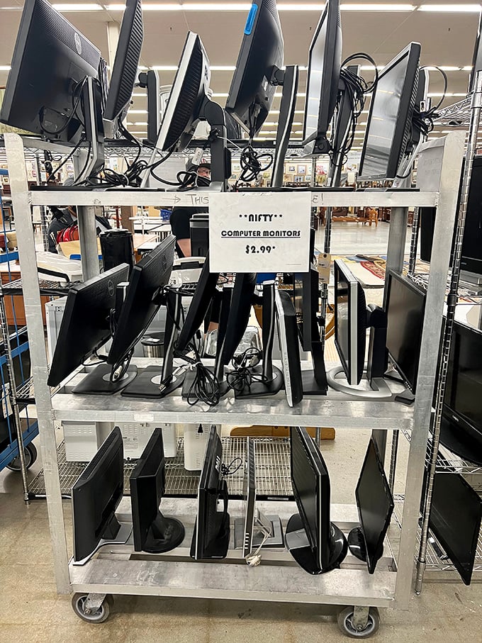 Computer monitors line up like eager contestants on a game show, each one hoping to be chosen for a second chance at desktop stardom.