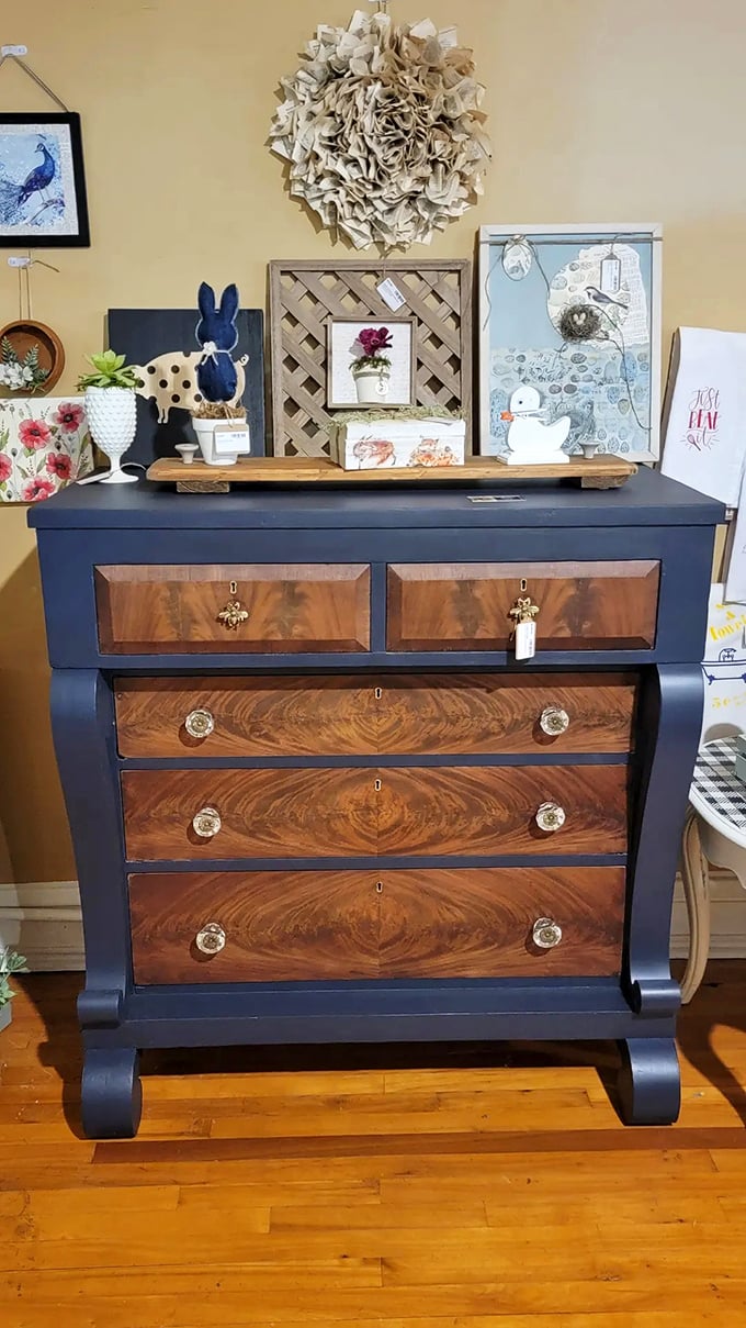 This navy and walnut Empire dresser doesn't just store clothes&mdash;it makes a statement that IKEA could only dream of achieving.
