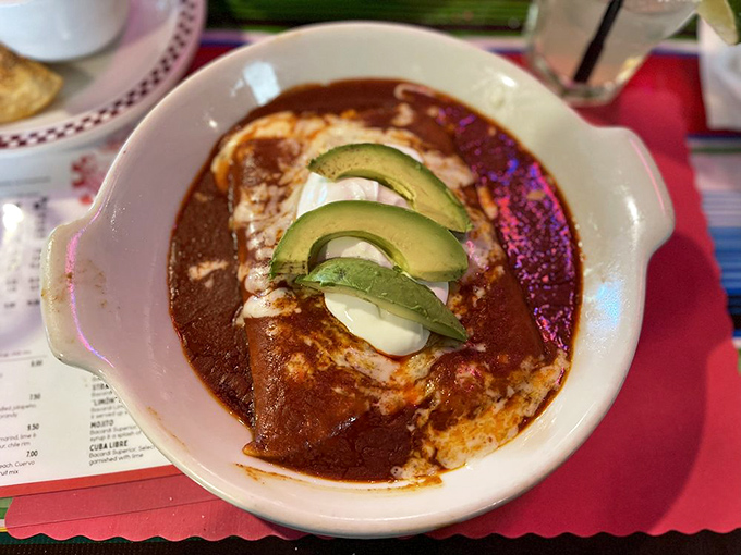These Enchiladas Poblanas swim in a mole sauce so complex and velvety, it makes you wonder if you've been eating enchiladas or just their distant, less interesting cousins.
