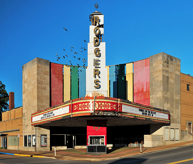 The vibrant Rodgers Theatre marquee stands as a colorful beacon of culture in downtown, its art deco charm preserved for future generations.