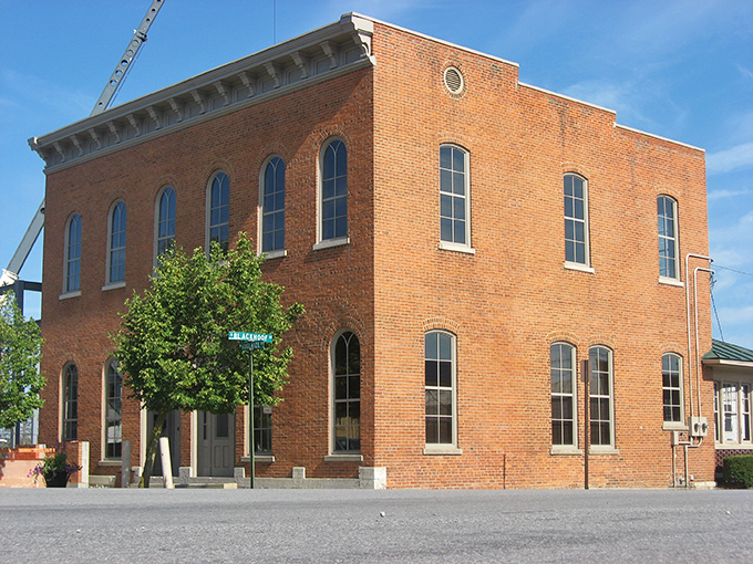 This beautifully preserved brick building has witnessed generations of Wapakoneta residents coming and going, its windows like eyes watching history unfold.