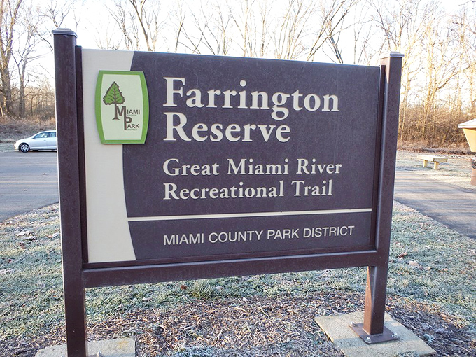 Farrington Reserve's sign might not look Instagram-worthy, but it marks the trailhead to adventures that no filter could improve.