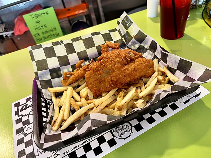 The fish plate arrives like a golden postcard from Old Florida – crispy, tender, and making you wonder why fancy restaurants complicate things.