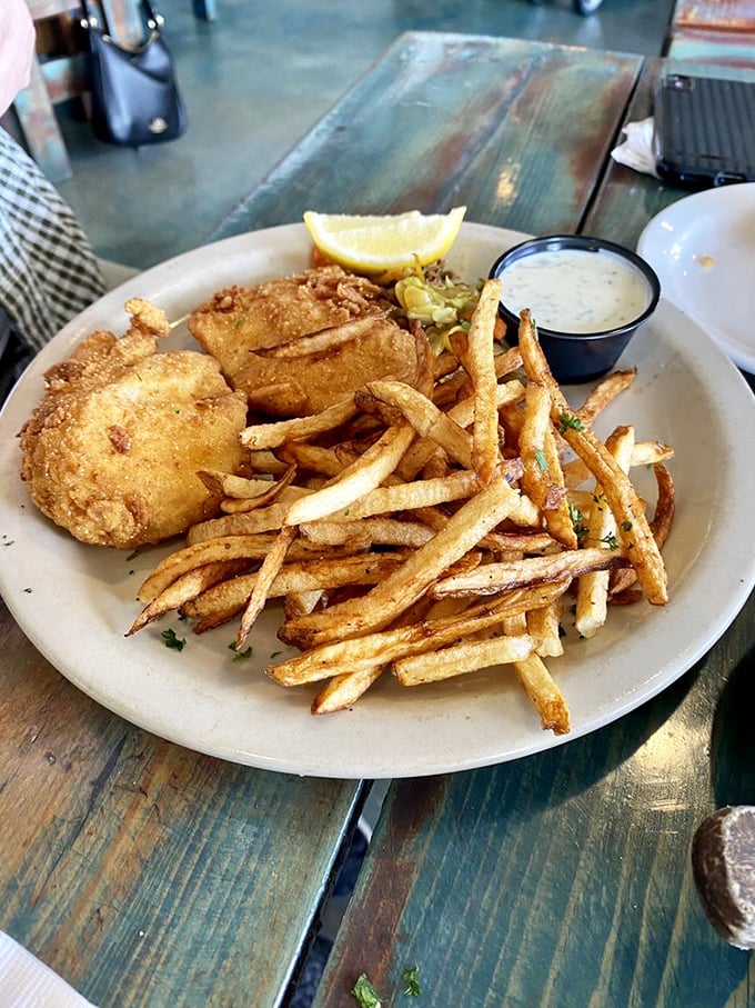 Fish so perfectly fried it makes you wonder if they've somehow discovered the secret eleventh commandment: Thou shalt not overcook. 