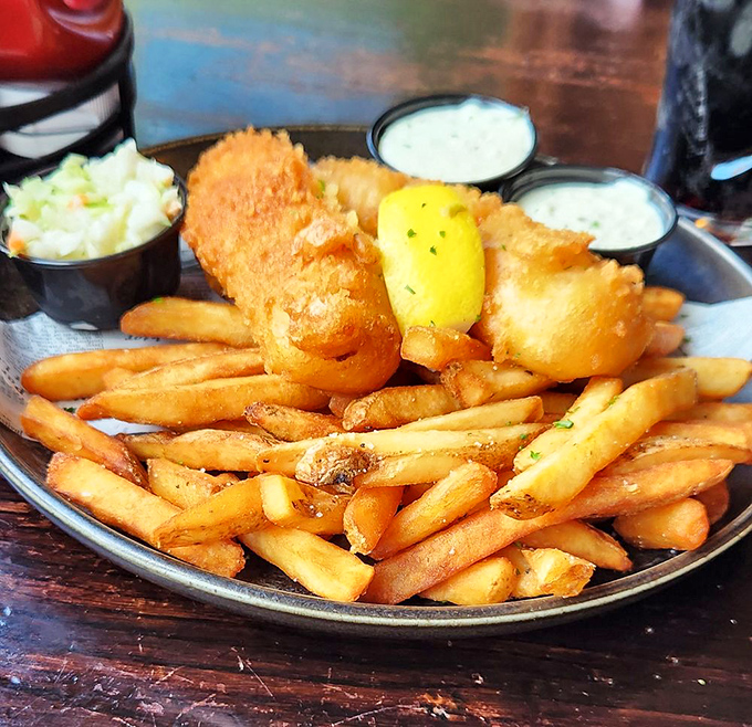 Golden-battered fish and chips that crackle with each bite, served with enough tartar sauce to satisfy even the most enthusiastic dipper.
