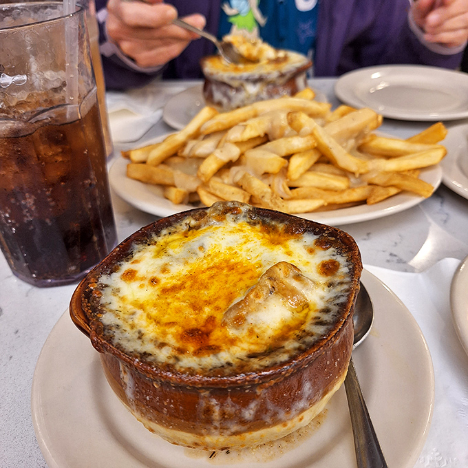 The star of the show arrives bubbling hot: French onion soup so divine, it'll restore your faith in comfort food.