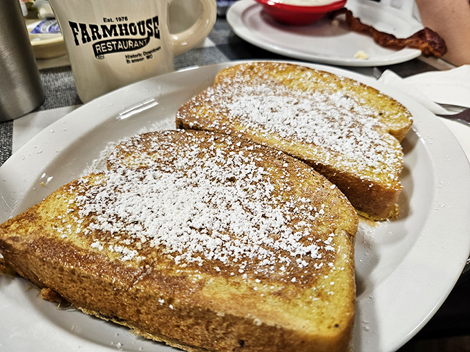 French toast dusted with powdered sugar like the first gentle snow of winter—simple perfection that doesn't need to show off.