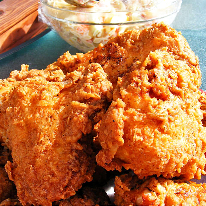 Fried chicken that would make your Southern grandmother weep with joy. That golden crust is practically begging you to break its perfect crispness.