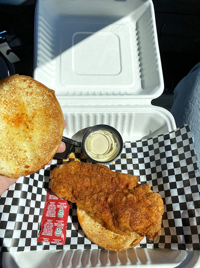 The ultimate road trip companion &ndash; a fried chicken sandwich that's worth pulling over for, complete with pickle slices for that perfect tang.