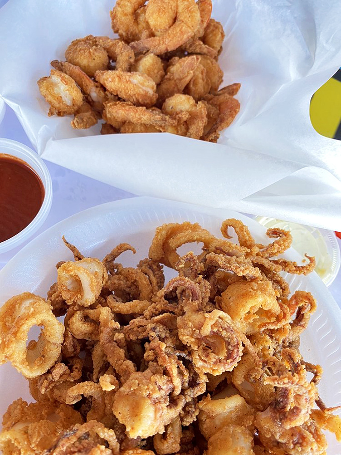 Golden-fried treasures from the deep. These crispy calamari rings and tender shrimp morsels are what fast food wishes it could be.
