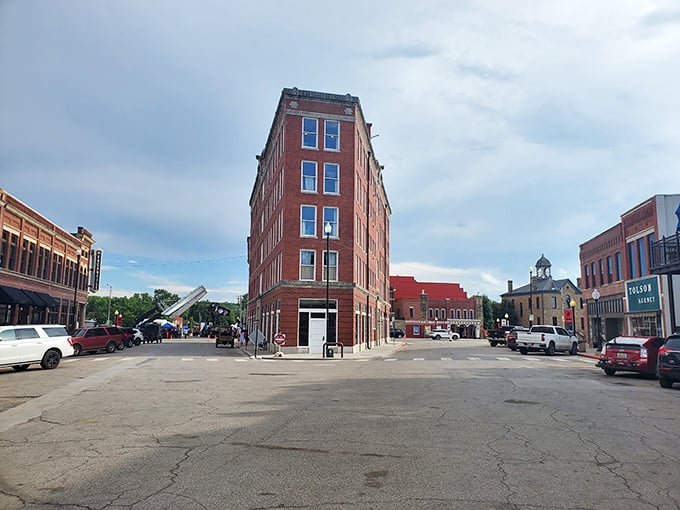 The iconic Triangle Building anchors downtown Pawhuska, defying conventional architecture with the confidence of someone who knows they look good from every angle.
