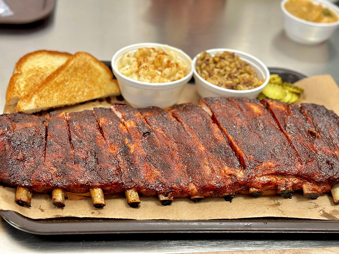 Ribs so perfectly lacquered they belong in a museum, except museums don't let you gnaw on the exhibits with such unbridled joy.