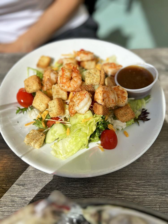 When salad gets serious: perfectly grilled shrimp, crisp greens, and homemade croutons. Even vegetable skeptics will be converted.