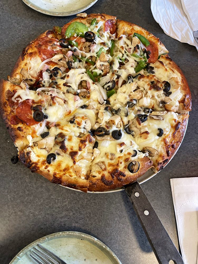 
When you can't decide between toppings, Monument's half-and-half pizza solves life's greatest dilemma without requiring therapy or a coin flip. 