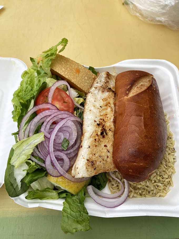 This grilled halibut sandwich isn't just lunch&mdash;it's a California coastal vacation between two pieces of sourdough, complete with fresh veggies and ocean views.