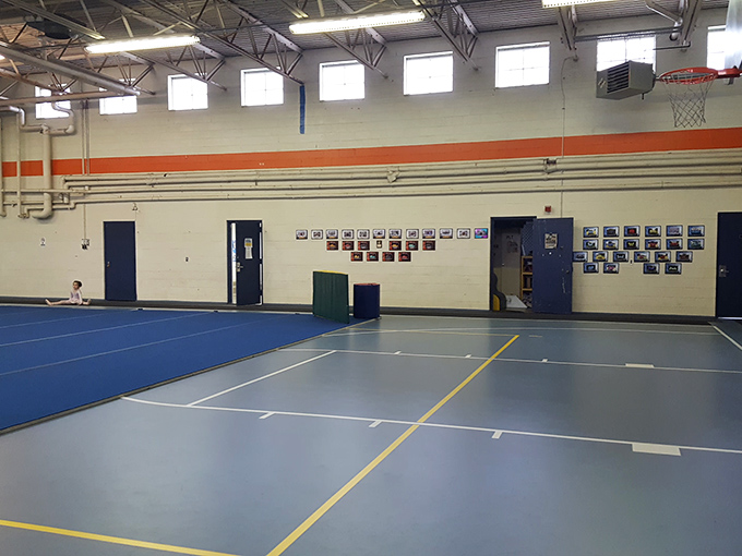 This recreation hall might lack architectural flair, but it's where community happens&mdash;basketball games, town meetings, and the occasional heated debate about zoning.