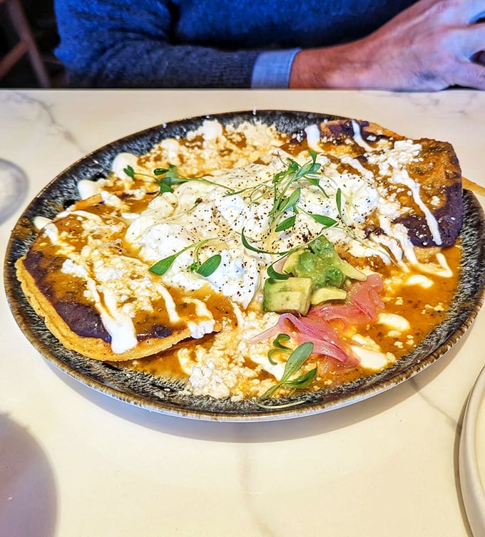 Huevos rancheros that could cure any hangover or existential crisis. That sauce is doing more emotional healing than your therapist.