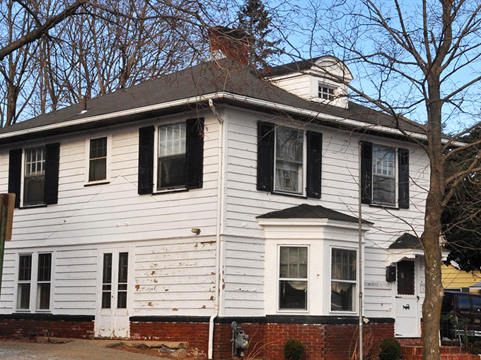 This classic white colonial house has witnessed more Hackettstown history than any history book could hold, its weathered siding a testament to endurance.