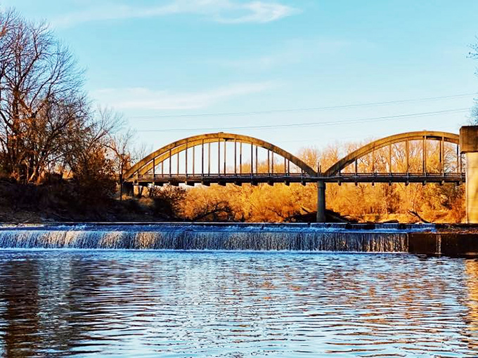 This bridge doesn't just span water&mdash;it connects past and present, its graceful arches creating a frame for some of Kansas's most serene waterscapes.