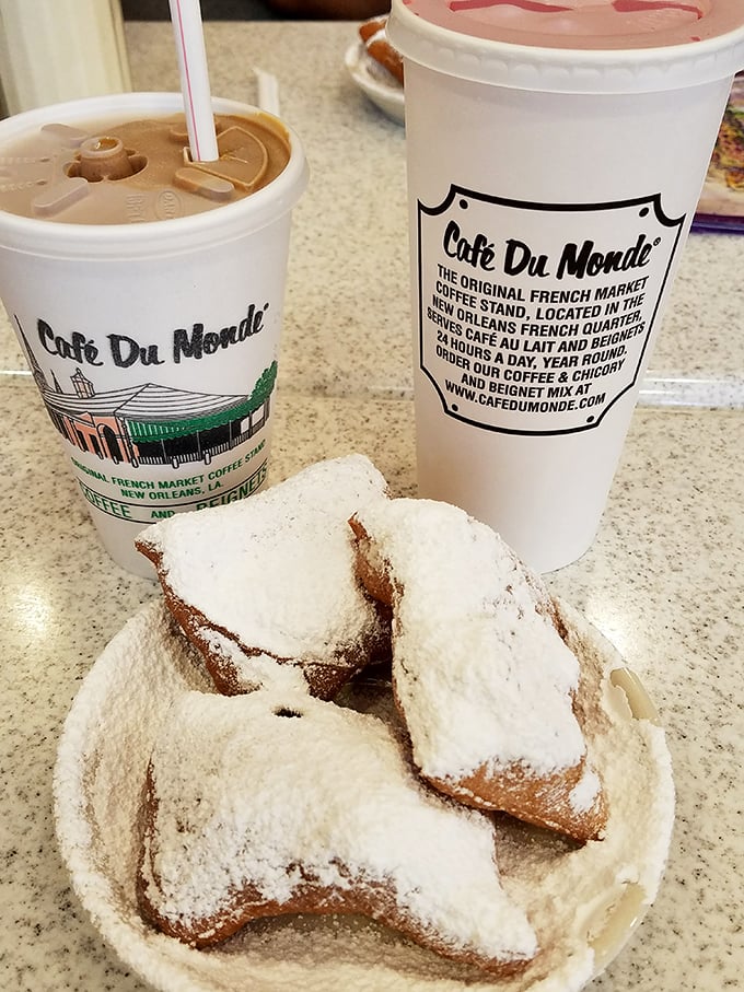 Summer in Louisiana demands cold caffeine alongside your sugar fix. This iced coffee and beignet combo is basically air conditioning for your soul.