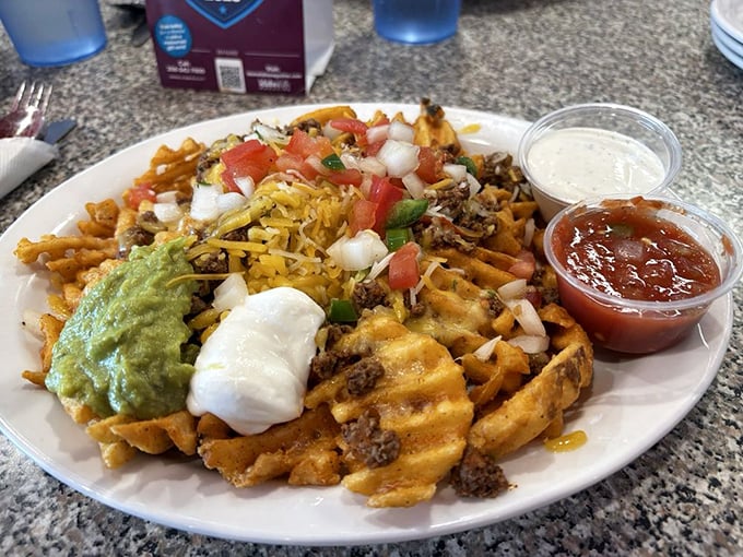 Idaho Nachos transform the humble french fry into an adventure, loaded with seasoned beef, cheese, and enough toppings to make a potato farmer proud. 