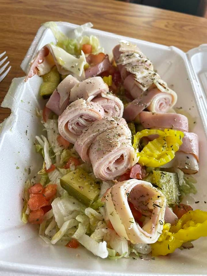 When you can't decide between a hoagie and a salad, Biaggio's says, "Why choose?" Italian cold cuts doing the backstroke in fresh veggies.