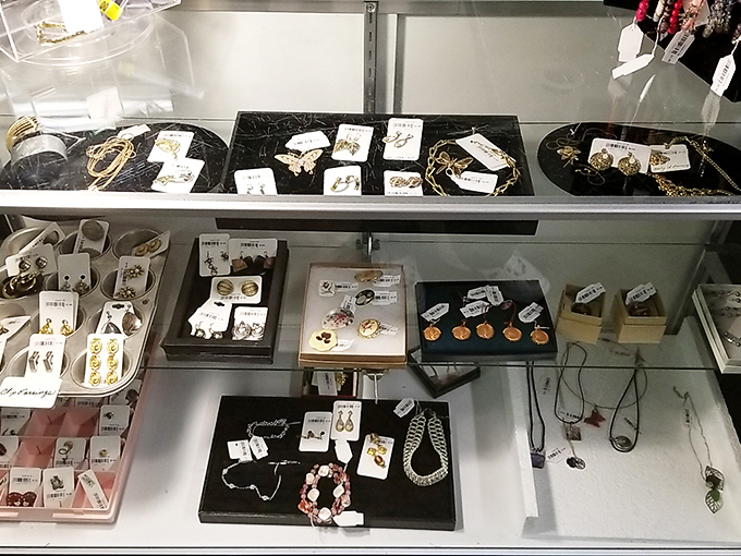 The jewelry counter sparkles with possibility. That perfect vintage brooch your grandmother once wore might be hiding right here.