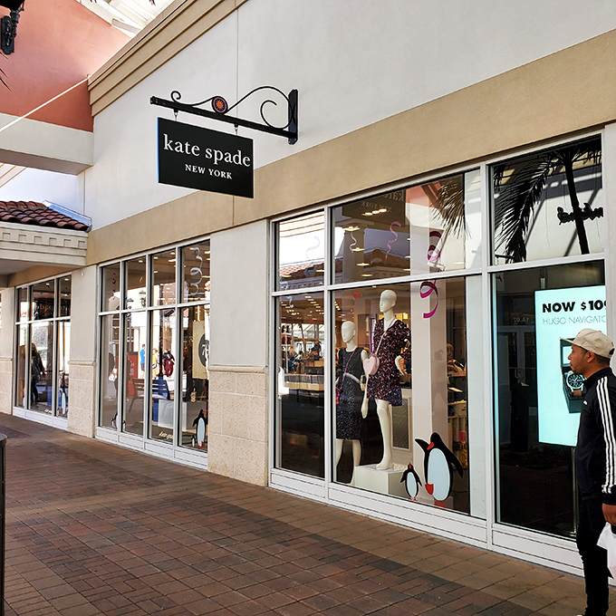 Kate Spade's colorful kingdom of handbags and accessories – where restraint goes to die and style is reborn