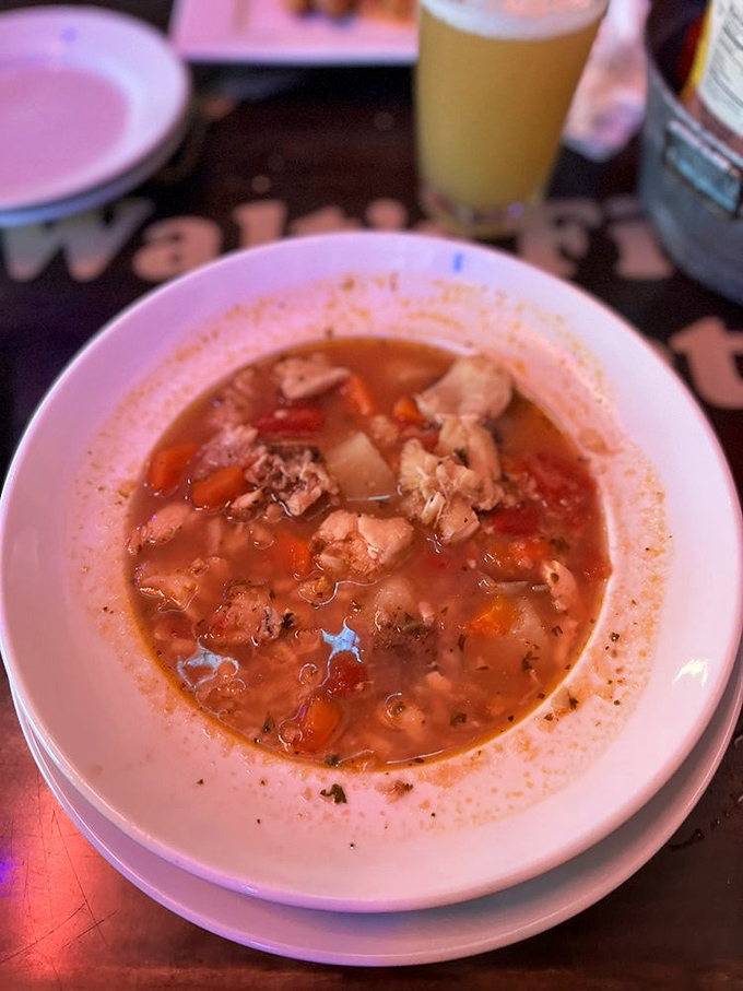 The Key West Chowder tells stories of the Gulf in every spoonful &ndash; a tomato-based symphony of local fish, potatoes, and subtle spices.