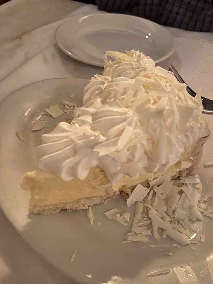 Key lime pie that strikes the perfect balance between sweet and tart, topped with enough whipped cream to make you forget you're supposed to be saving room.
