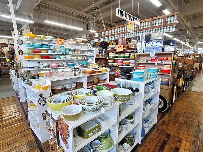 The Pyrex rainbow! Grandmother's kitchen classics arranged in a color spectrum that would make Marie Kondo weep with organizational joy.