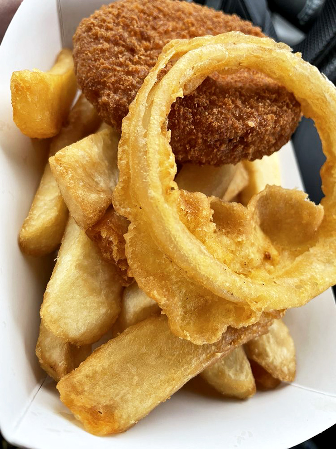 These golden-brown croquettes look like they've been kissed by the deep fryer gods, creating the perfect crispy-to-creamy ratio that makes you close your eyes with each bite.