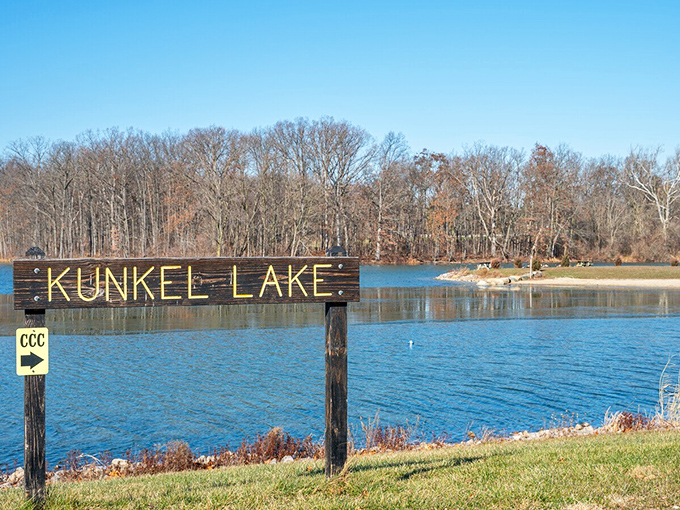 Kunkel Lake shimmers like nature's mirror, reflecting both sky and trees in a display that no Instagram filter could possibly improve.