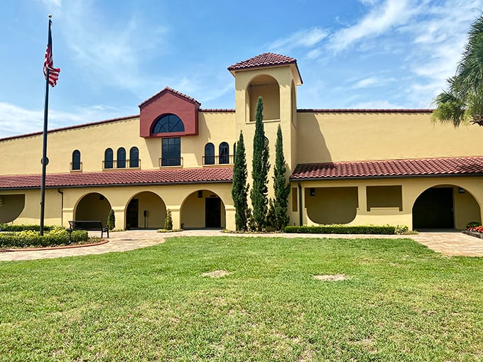 Mediterranean meets Florida at this Spanish-style building. With its terracotta roof and stucco walls, it's giving serious "I vacationed in Tuscany once" energy.