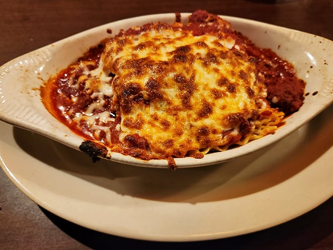 This lasagna isn't just baked, it's been transformed into a bubbling, golden-brown masterpiece that demands your immediate attention.