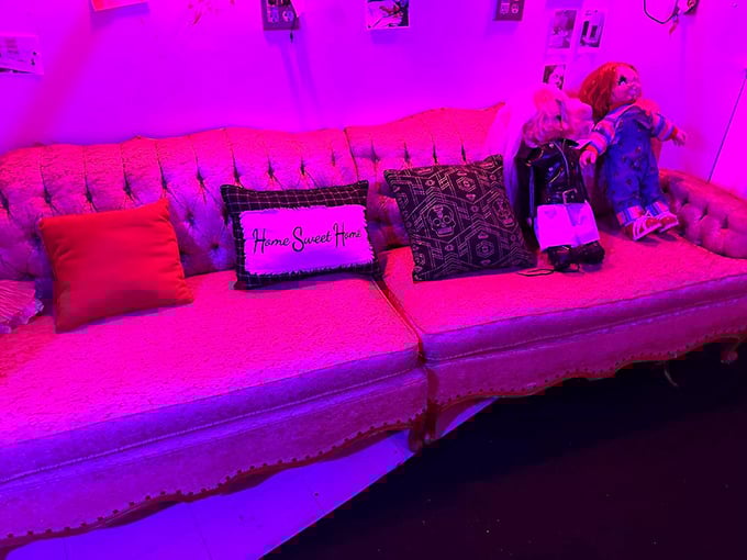 The "Home Sweet Home" pillow is a delightful touch of irony in this pink-hued lounge that would make the Overlook Hotel proud.