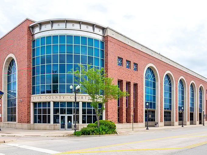 The Lyon County Courthouse combines traditional arches with modern glass in a building that says "justice" without shouting it.
