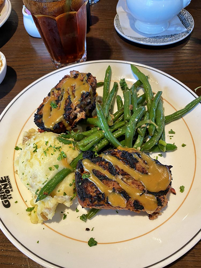 Not your mama's meatloaf (though she'd approve) &ndash; draped in savory sauce alongside green beans that actually taste like vegetables should.