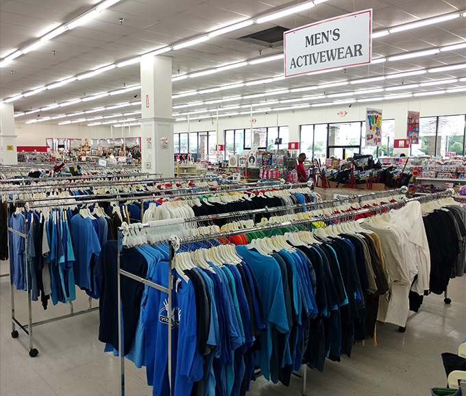 The men's activewear section: where workout intentions meet wallet-friendly reality. Those moisture-wicking shirts work just as well at half the retail price.