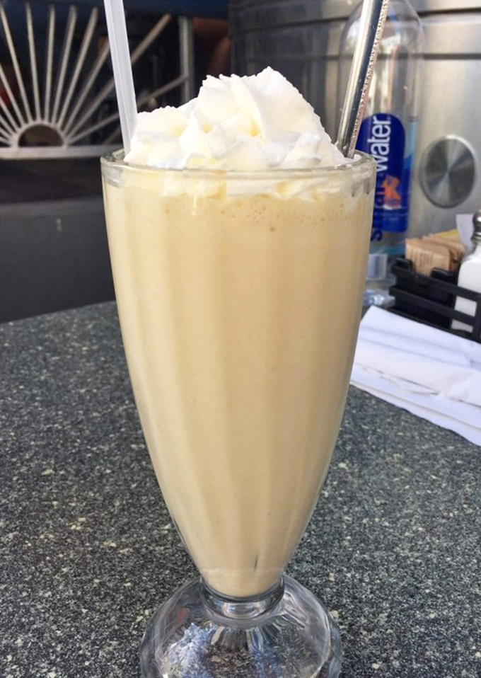 A vanilla milkshake so thick you'll get an arm workout with your dessert&mdash;topped with whipped cream that's basically announcing "no regrets."