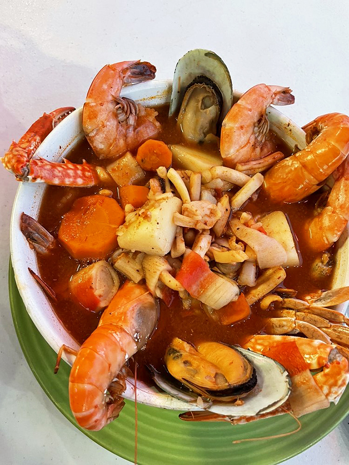 The 7 Mares soup is basically the ocean in a bowl—shrimp, mussels, and vegetables swimming in a broth that tastes like a vacation.