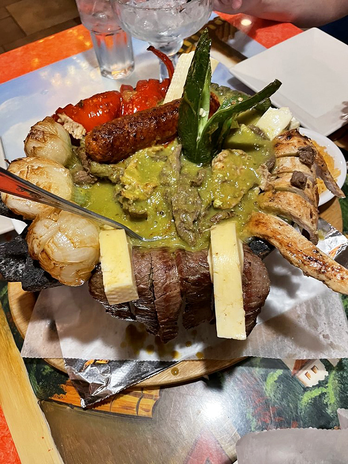 The Molcajete isn't just a dish&mdash;it's a volcanic rock star of the menu, erupting with grilled meats, seafood, and vegetables in a savory sauce.