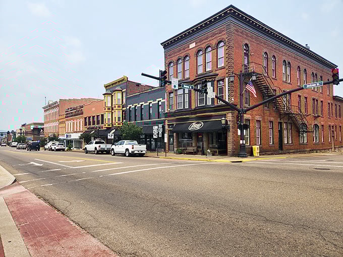 Monroe Street's brick buildings have weathered economic storms for generations, housing businesses where handshakes still mean more than online reviews.