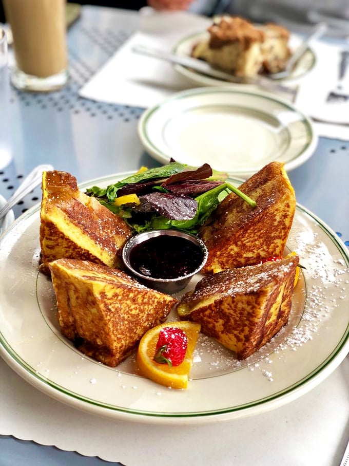 The Monte Cristo: where French toast and sandwich had a beautiful baby. Powdered sugar, jam, and that perfect golden crust—it's breakfast engineering at its finest.
