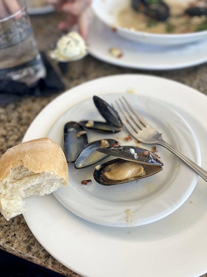 These mussels aren't just showing off their muscles—they're swimming in a broth so good you'll be asking for extra bread for dipping.