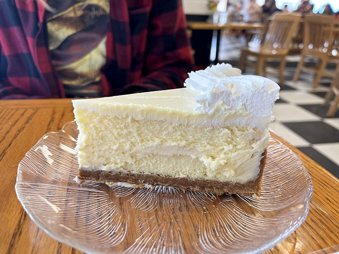 The New York cheesecake sits regally on its crystal throne, daring you to find a more perfect balance of density and delicacy.