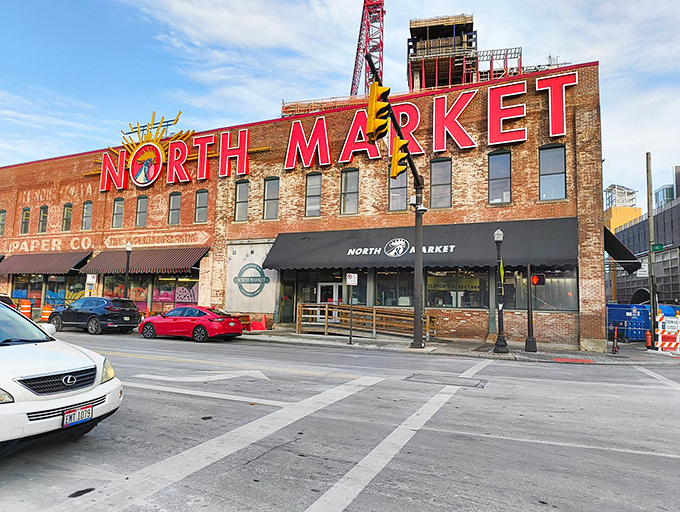 North Market&mdash;where food shopping becomes a contact sport. Local vendors hawk everything from spices to pierogies under the watchful eye of that iconic sign.