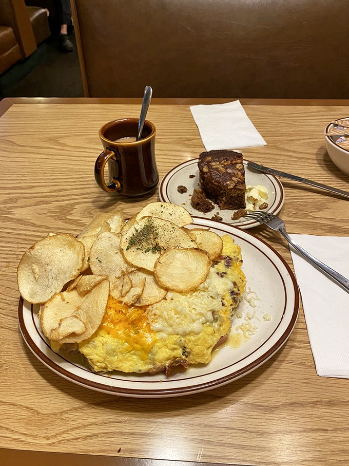 The perfect omelet should be a fluffy canvas for culinary creativity, accompanied by homemade chips that shatter satisfyingly with each bite.
